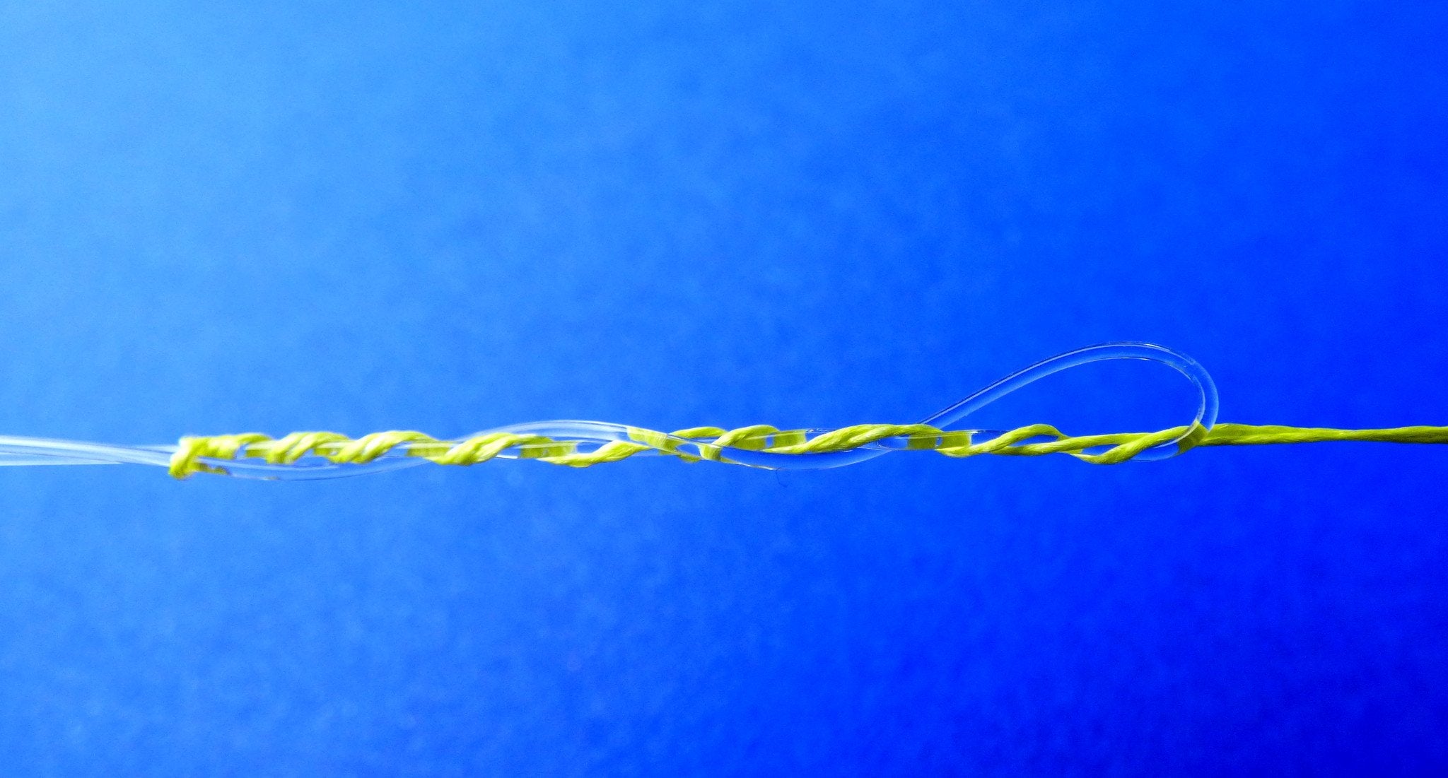 Connecting Braided line to Mono using a Surgeon's loop to tie the Yuca ...